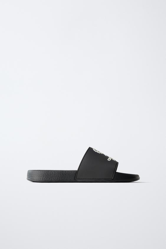 CHAMPIONS LEAGUE ® GLOW IN THE DARK POOL SLIDERS - Black | ZARA Singapore