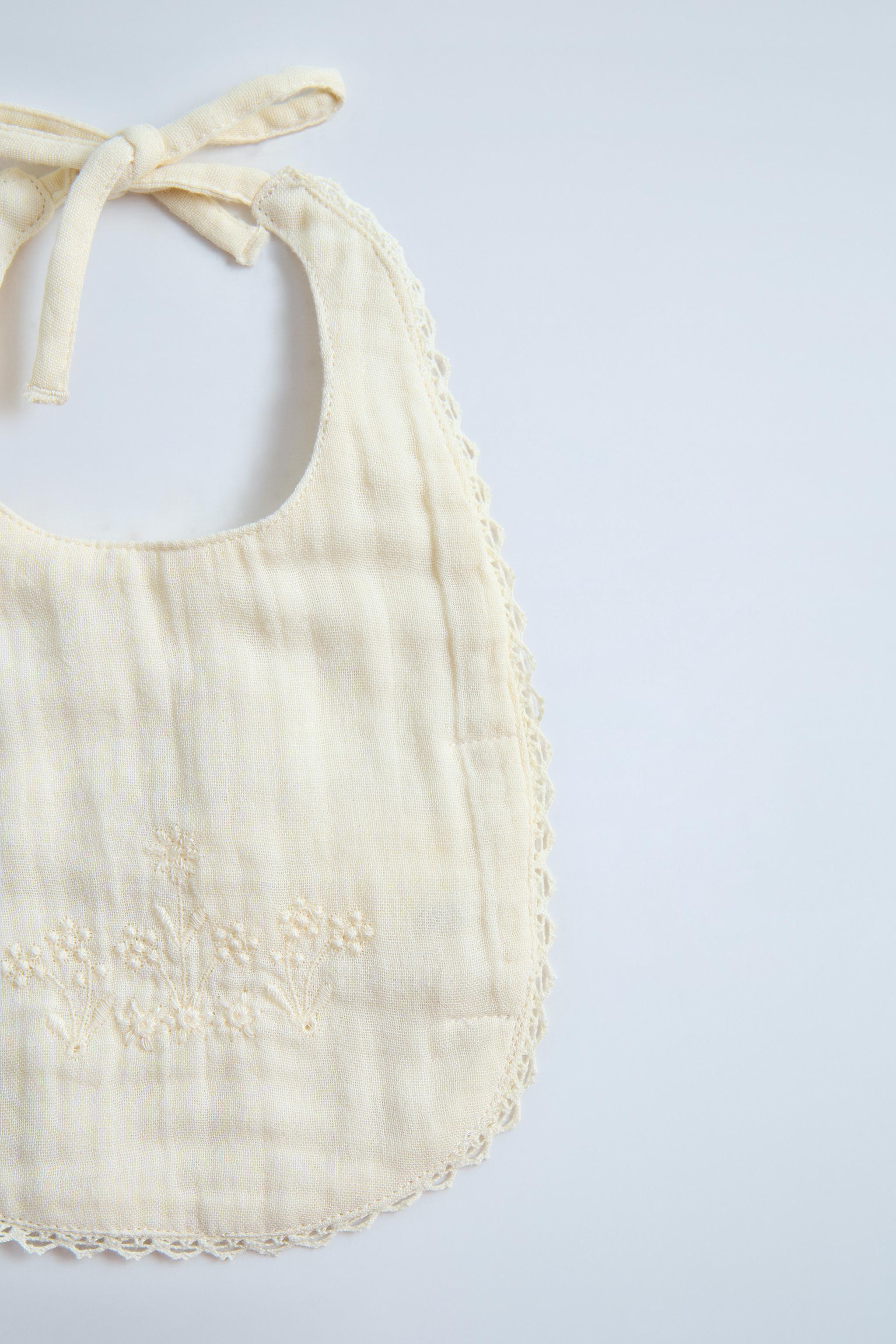 Embroidered bib store