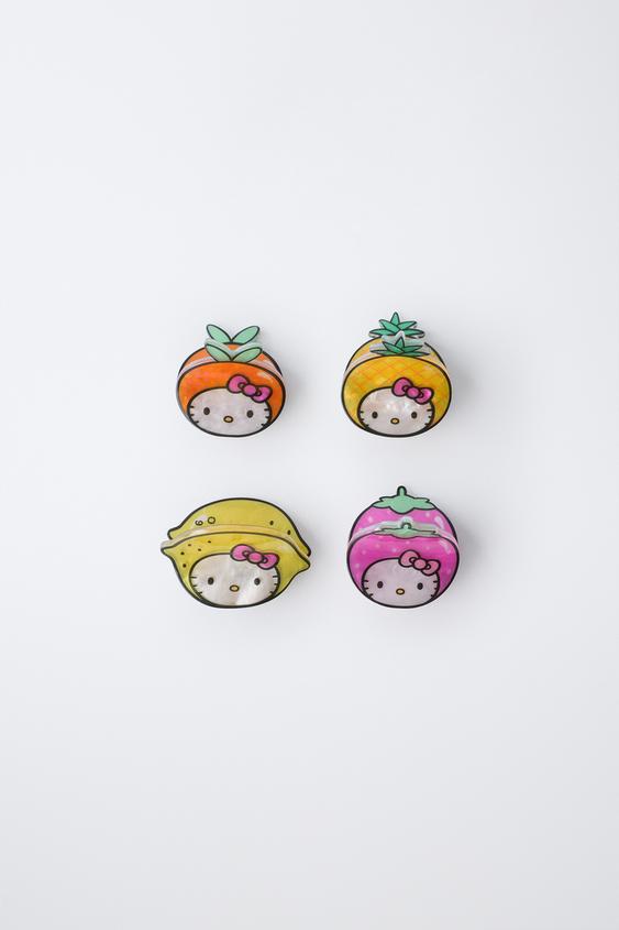 CONFEZIONE DA QUATTRO FERMAGLI FRUTTA HELLO KITTY © SANRIO - Rosa ...