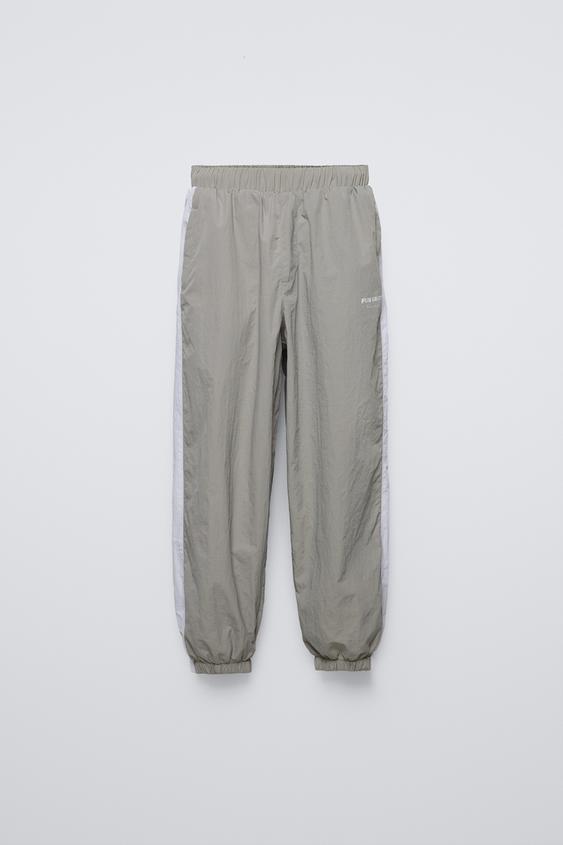 LINED TECHNICAL TROUSERS WITH SIDE STRIPES - Black / White | ZARA Thailand